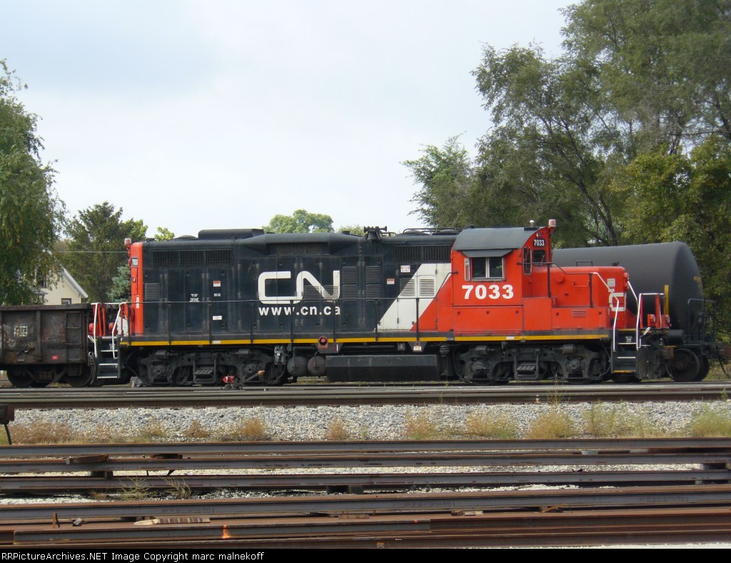 CN 7033